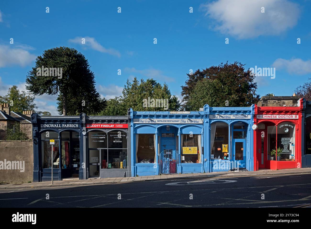 Row of small independent shops with 'Nessie' formed by a chance ...