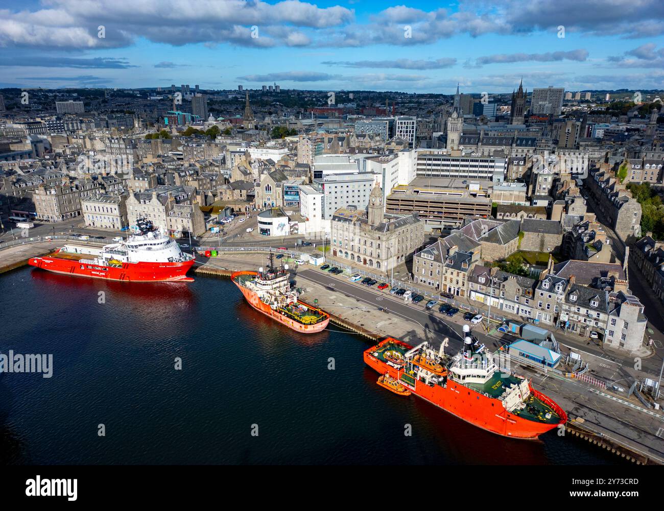 Aerial view from drone of ships in harbour and city skyline in Aberdeen ...