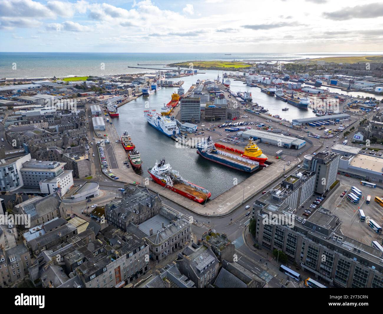 Aerial view from drone of ships in harbour and city skyline in Aberdeen ...