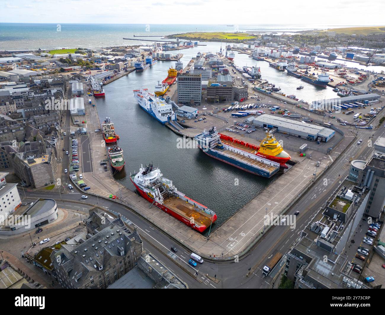 Aerial view from drone of ships in harbour and city skyline in Aberdeen ...