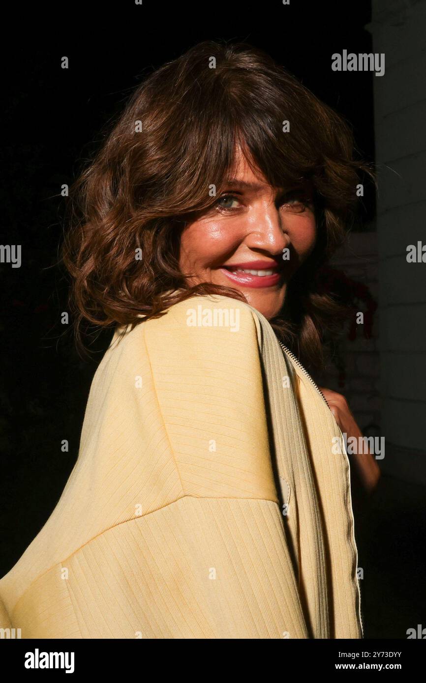 Helena Christensen attends the Victoria Beckham Spring/Summer 2025 ...
