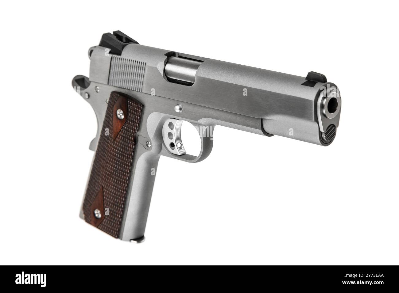 Silver pistol with a wooden handle. Short-barreled weapon. Modern semi ...