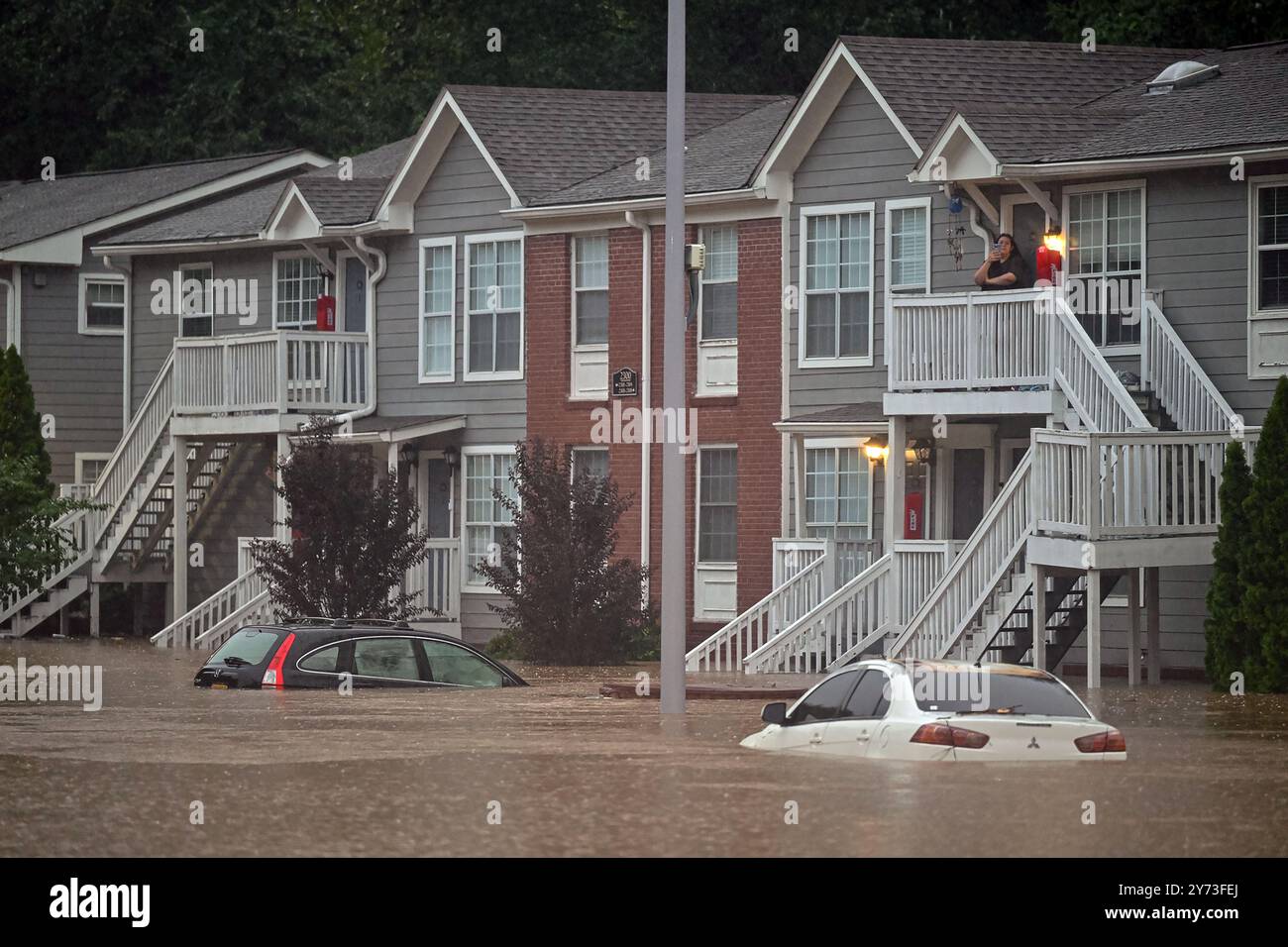 Atlanta, Georgia, USA. 27th Sep, 2024. Flood surge traps cars and ...