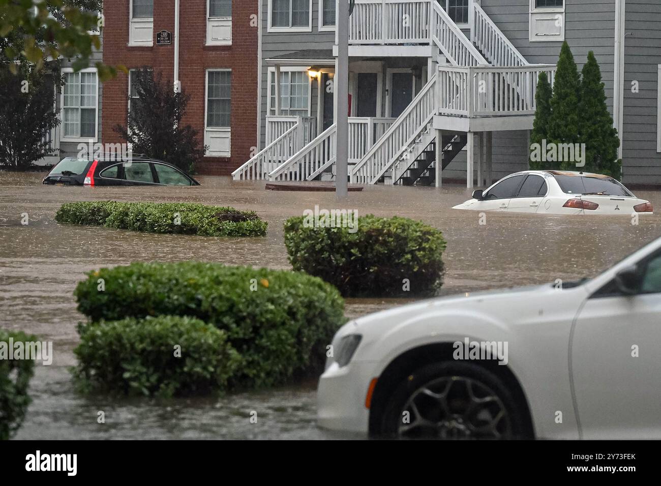 Atlanta, Georgia, USA. 27th Sep, 2024. Flood surge traps cars and ...