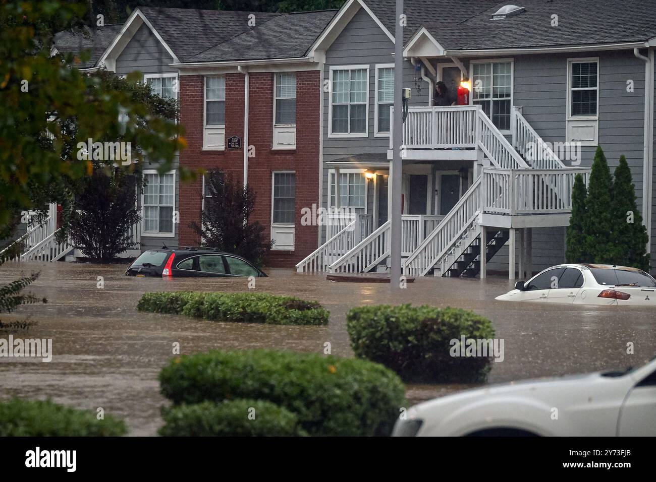 Atlanta, Georgia, USA. 27th Sep, 2024. Flood surge traps cars and ...