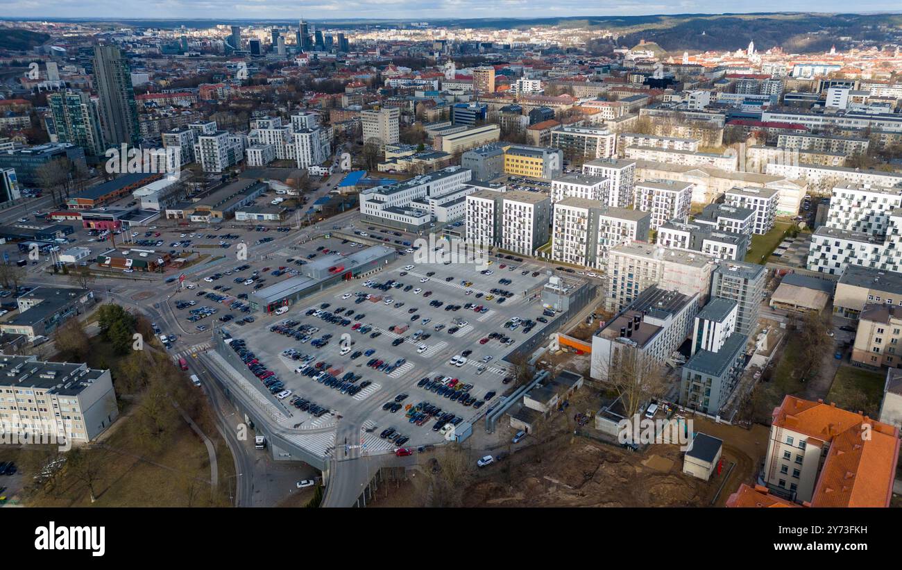 Aerial view of a modern urban area featuring a mix of residential and ...