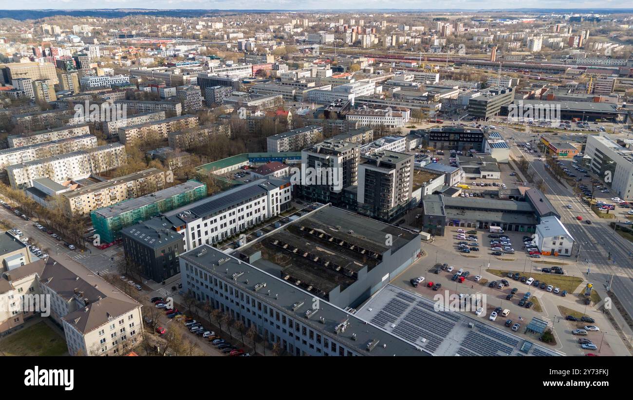 Aerial view of a modern urban area featuring a mix of residential and ...