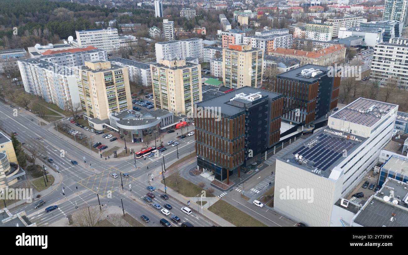 Aerial view of a modern urban area featuring a mix of residential and ...