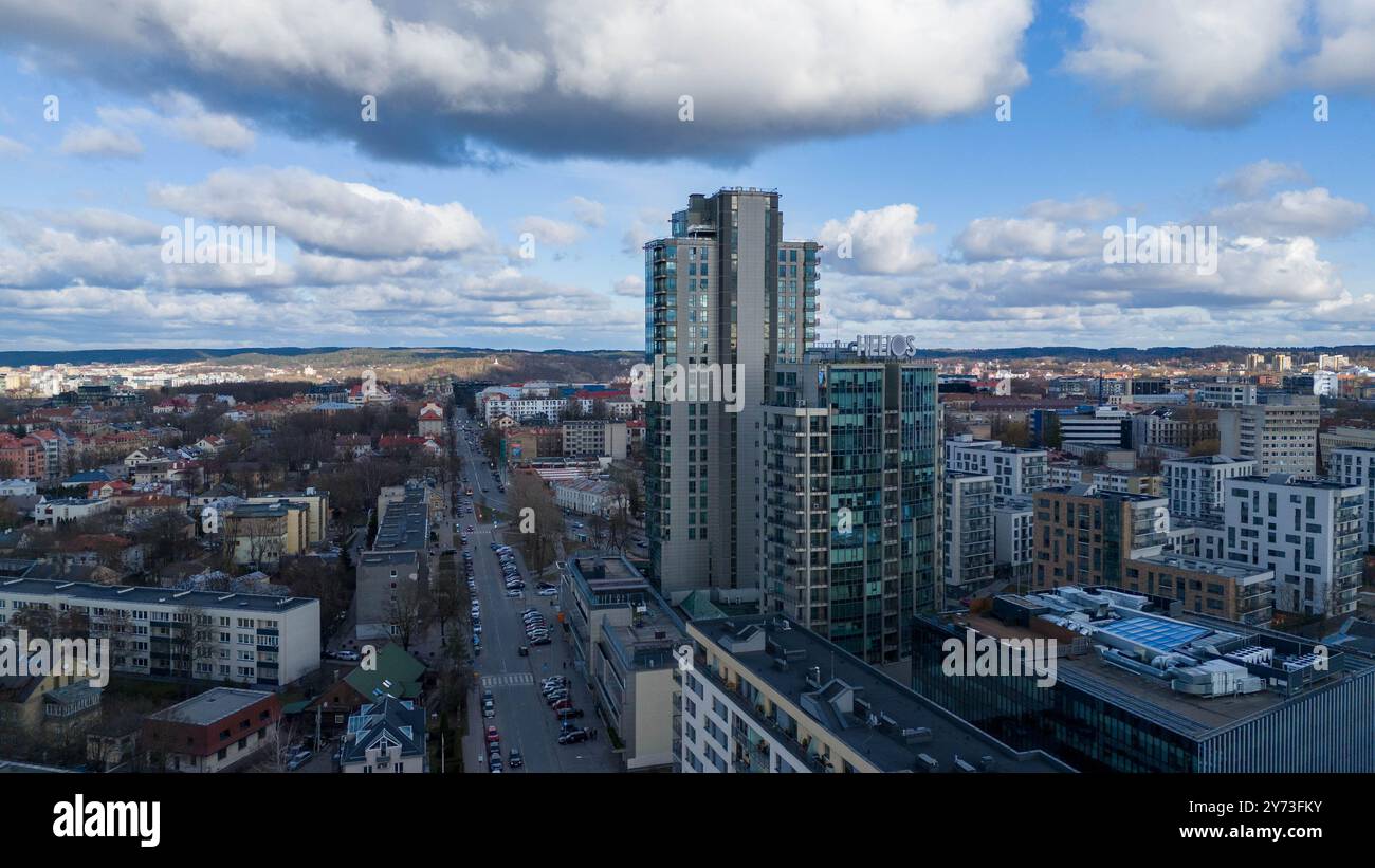 Aerial view of a modern urban area featuring a mix of residential and ...