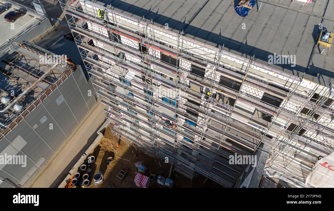 Aerial view of a construction site showing scaffolding on a building ...