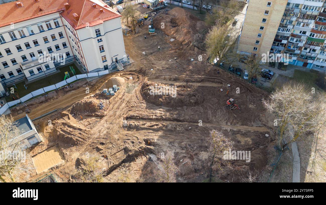 Aerial view of a landscaping construction site in an urban area between ...