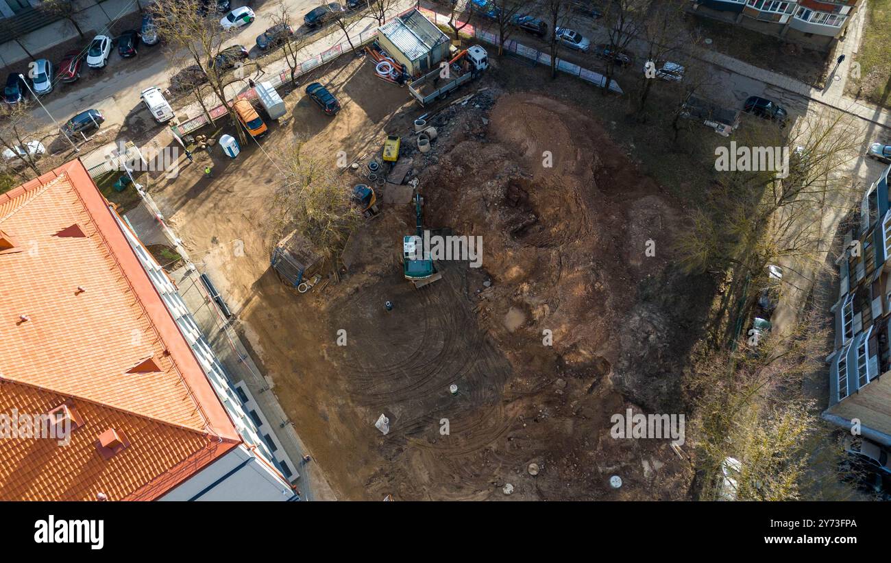Aerial view of a landscaping construction site in an urban area between ...