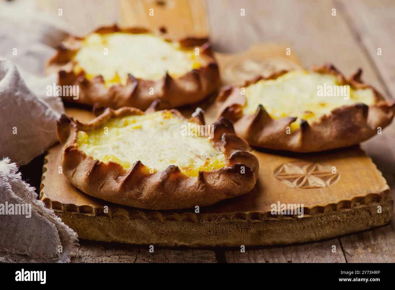 kalitka, traditional russian potato pie from rye dough. style rustic ...