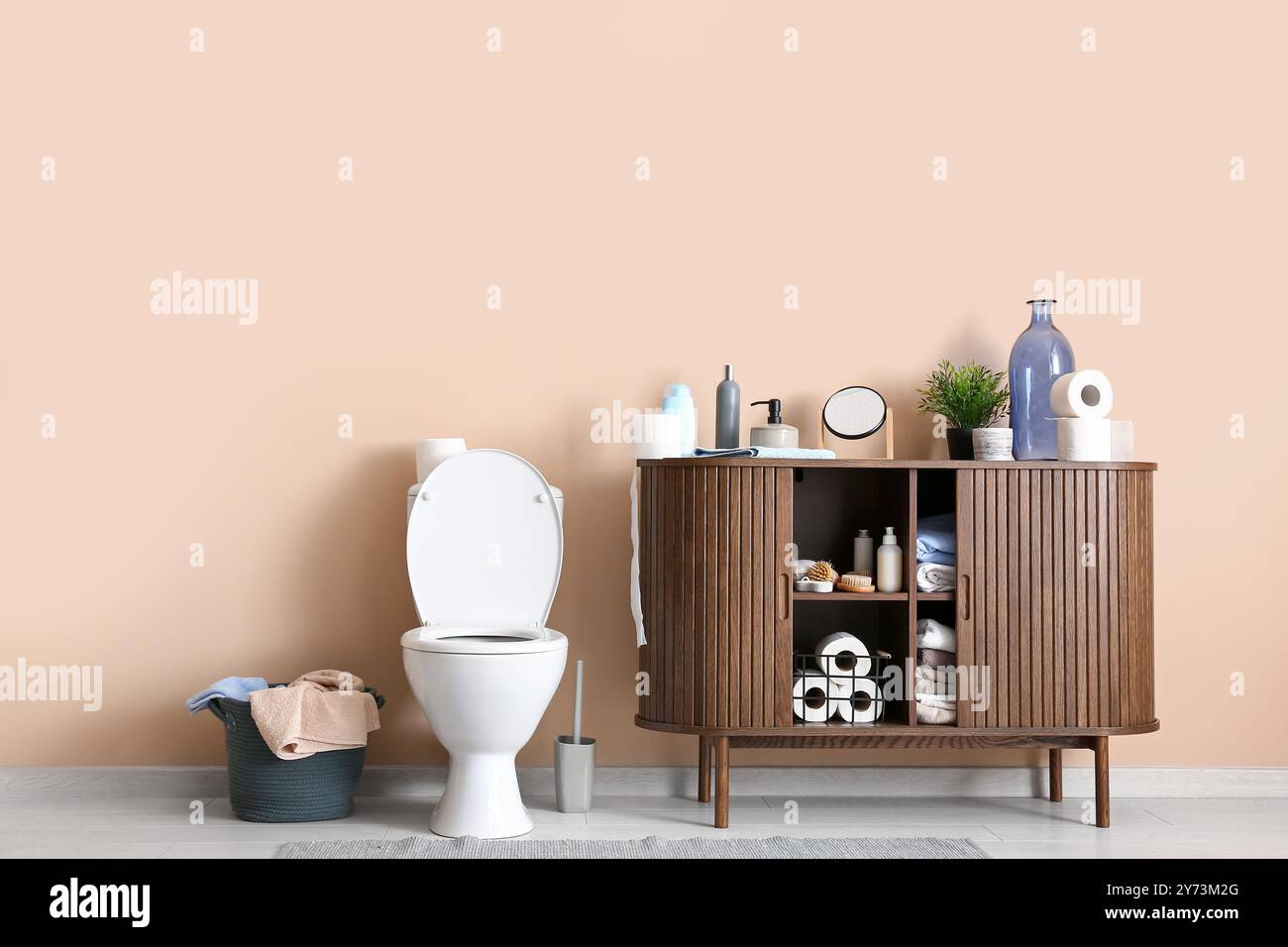 Stylish interior of modern restroom with different bath supplies Stock ...