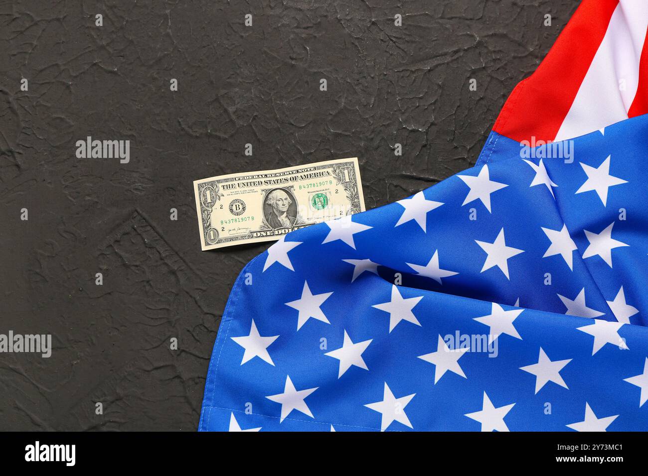 Flag of USA and dollar banknote on black background Stock Photo - Alamy