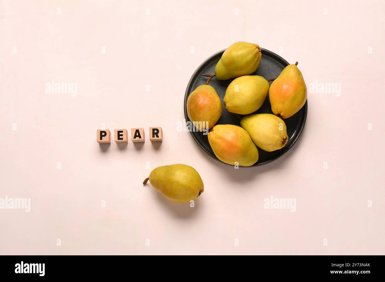 Word PEAR and plate with fresh fruits on white background Stock Photo ...
