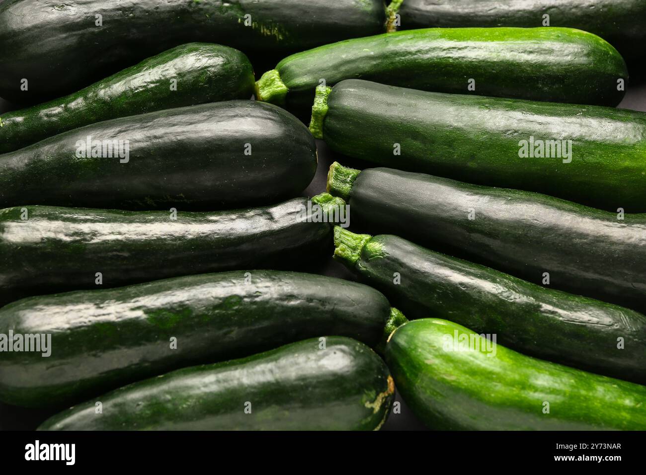 Texture of fresh green zucchini as background Stock Photo - Alamy