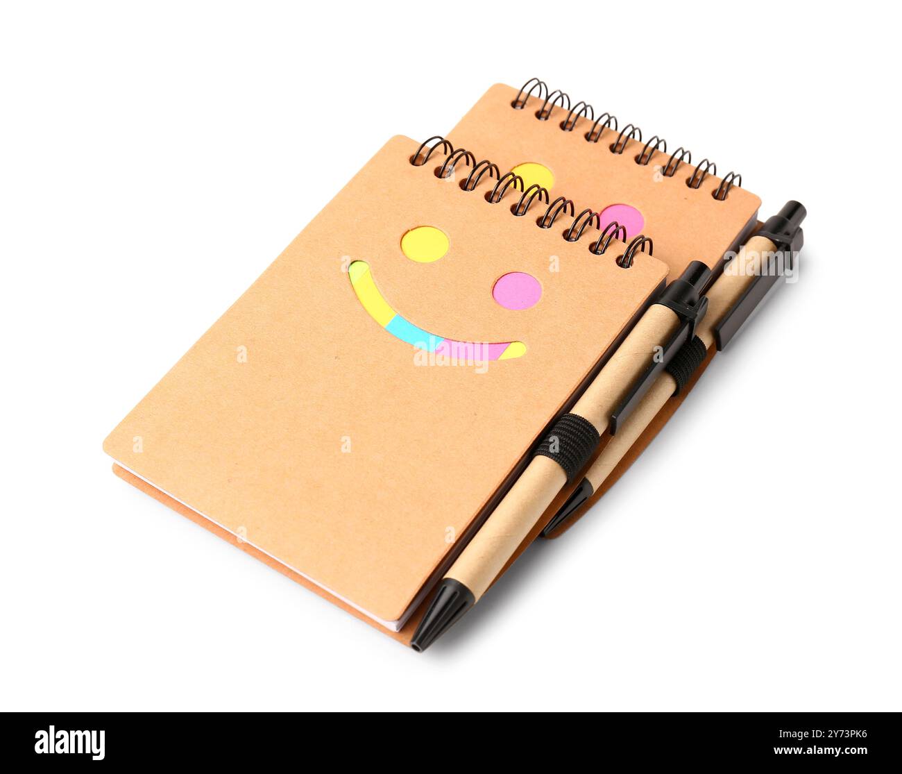 Stylish notebooks with pens on white background Stock Photo - Alamy