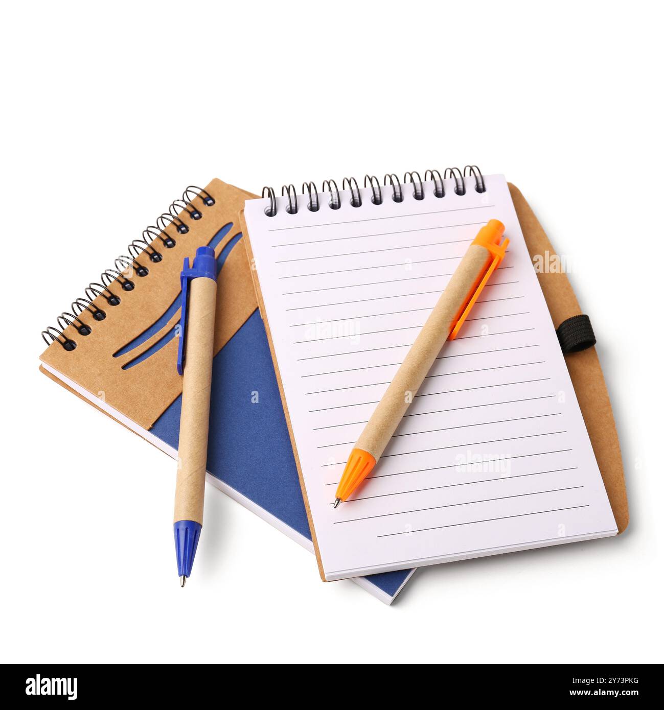 Stylish notebooks with pens on white background Stock Photo - Alamy