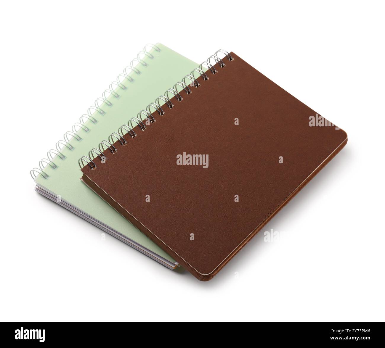 Different notebooks on white background Stock Photo - Alamy