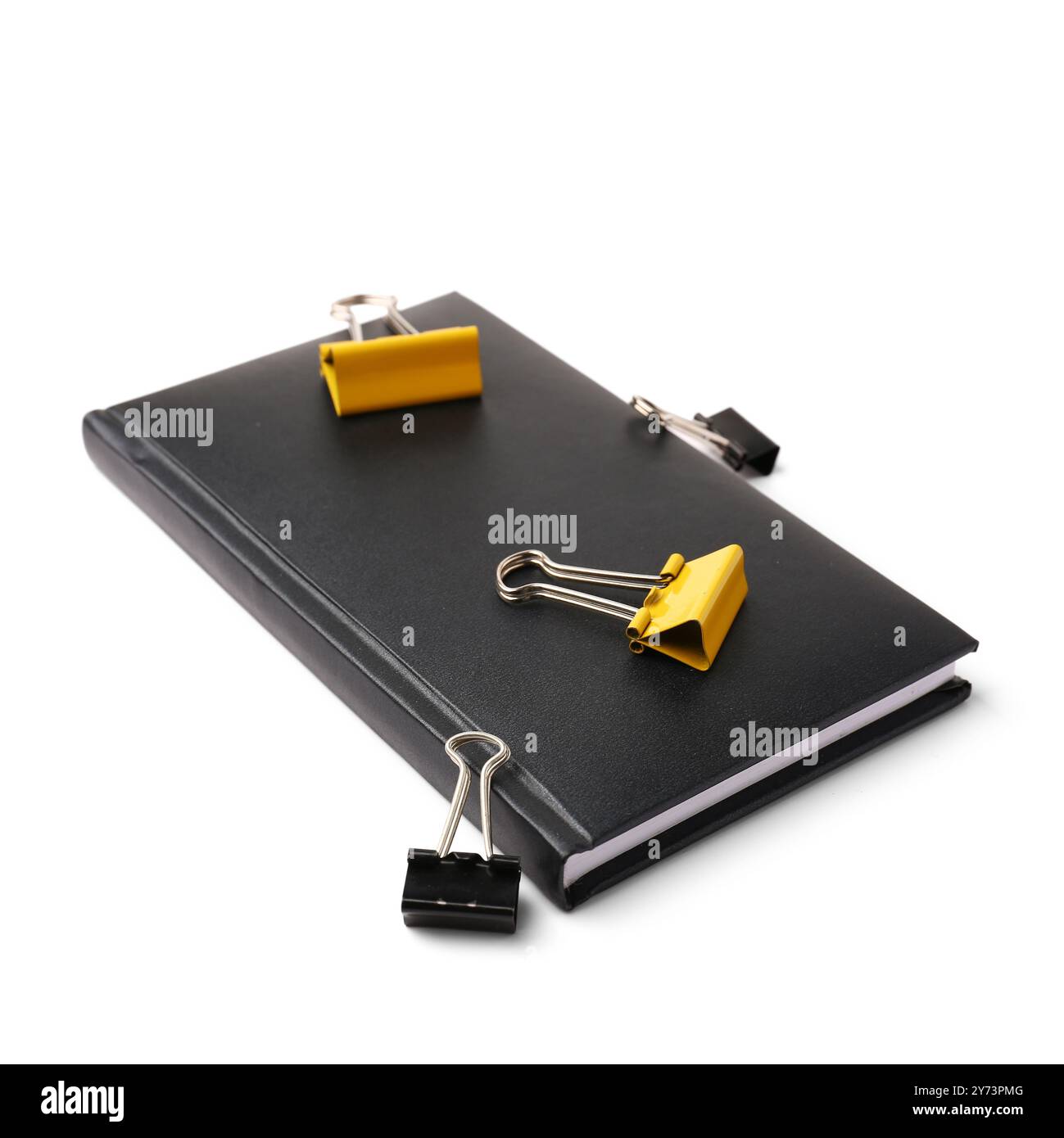 Black notebook and paper clips on white background Stock Photo - Alamy