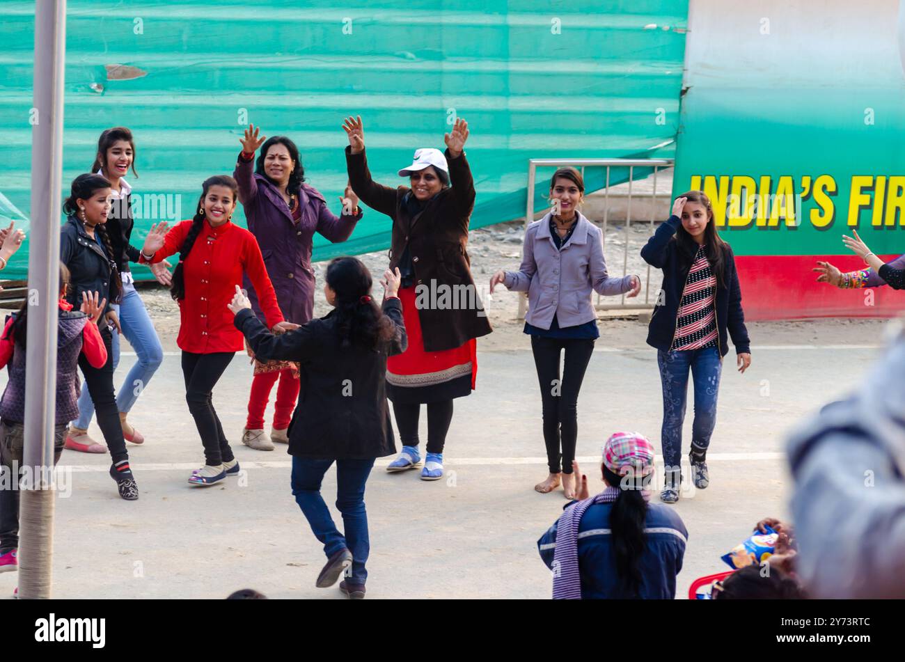 Tourists dancing during the Attari–Wagah border lowering of flag ...