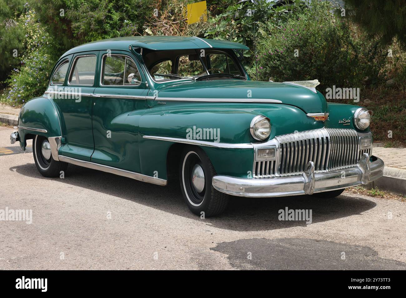 A vintage green DeSoto car parked outside Stock Photo - Alamy