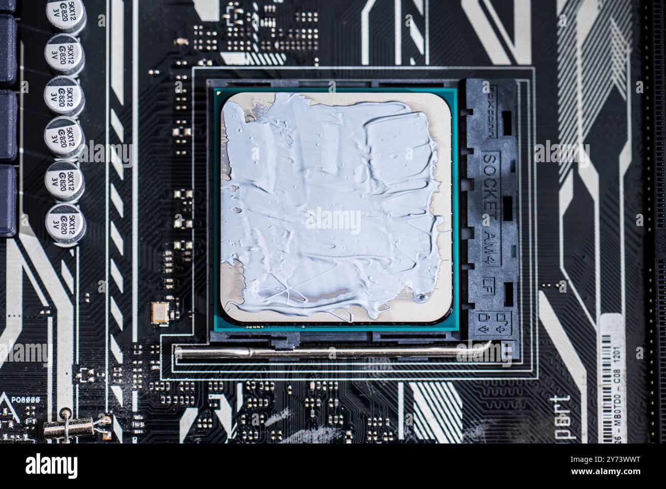 Gothenburg, Sweden - February 04 2023: AMD CPU with thermal paste in a ...