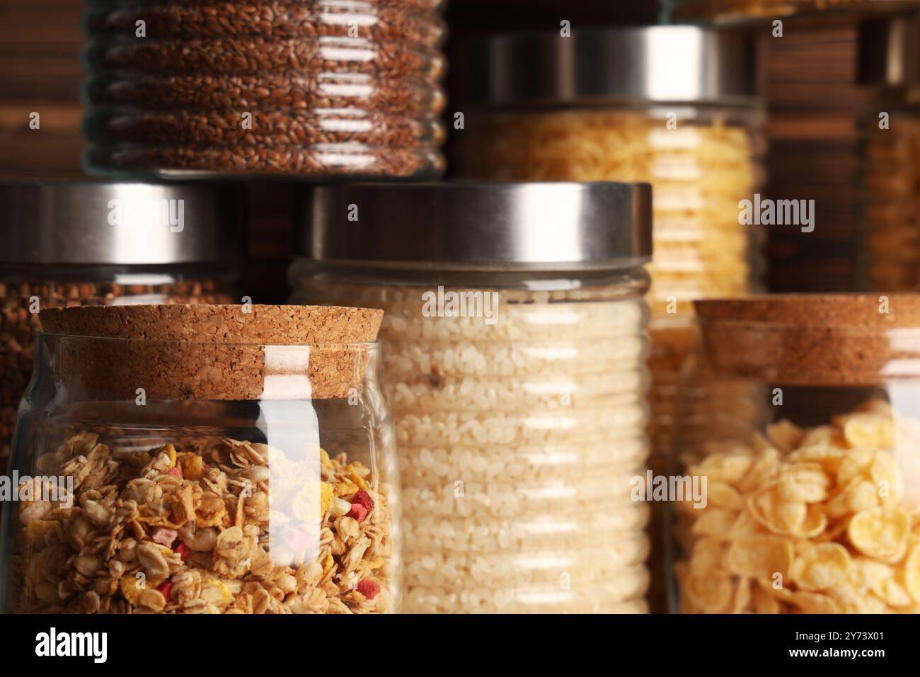 Closeup view of many glass jars with different products Stock Photo - Alamy