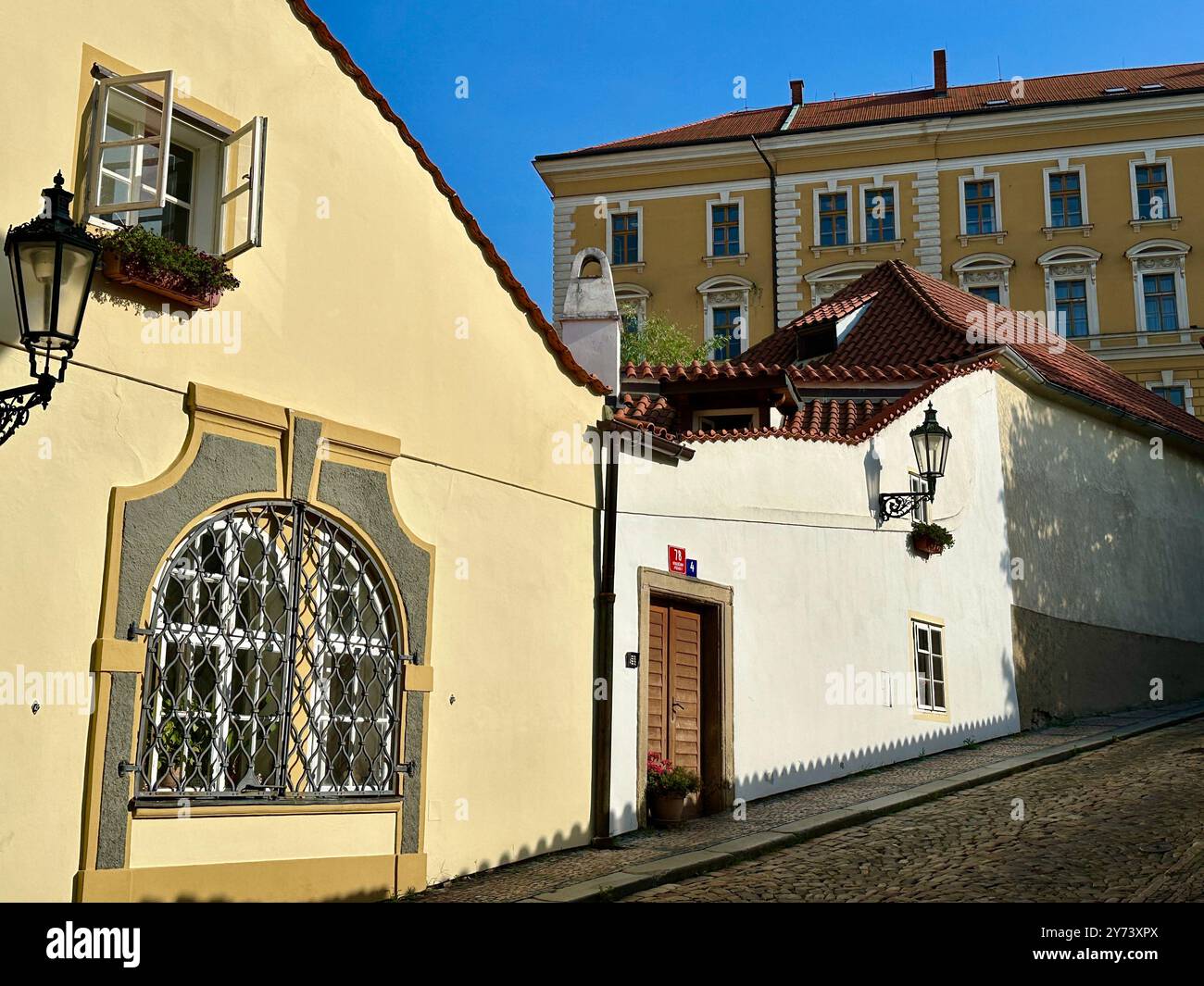 The photograph showcases a medieval European cityscape in summer ...