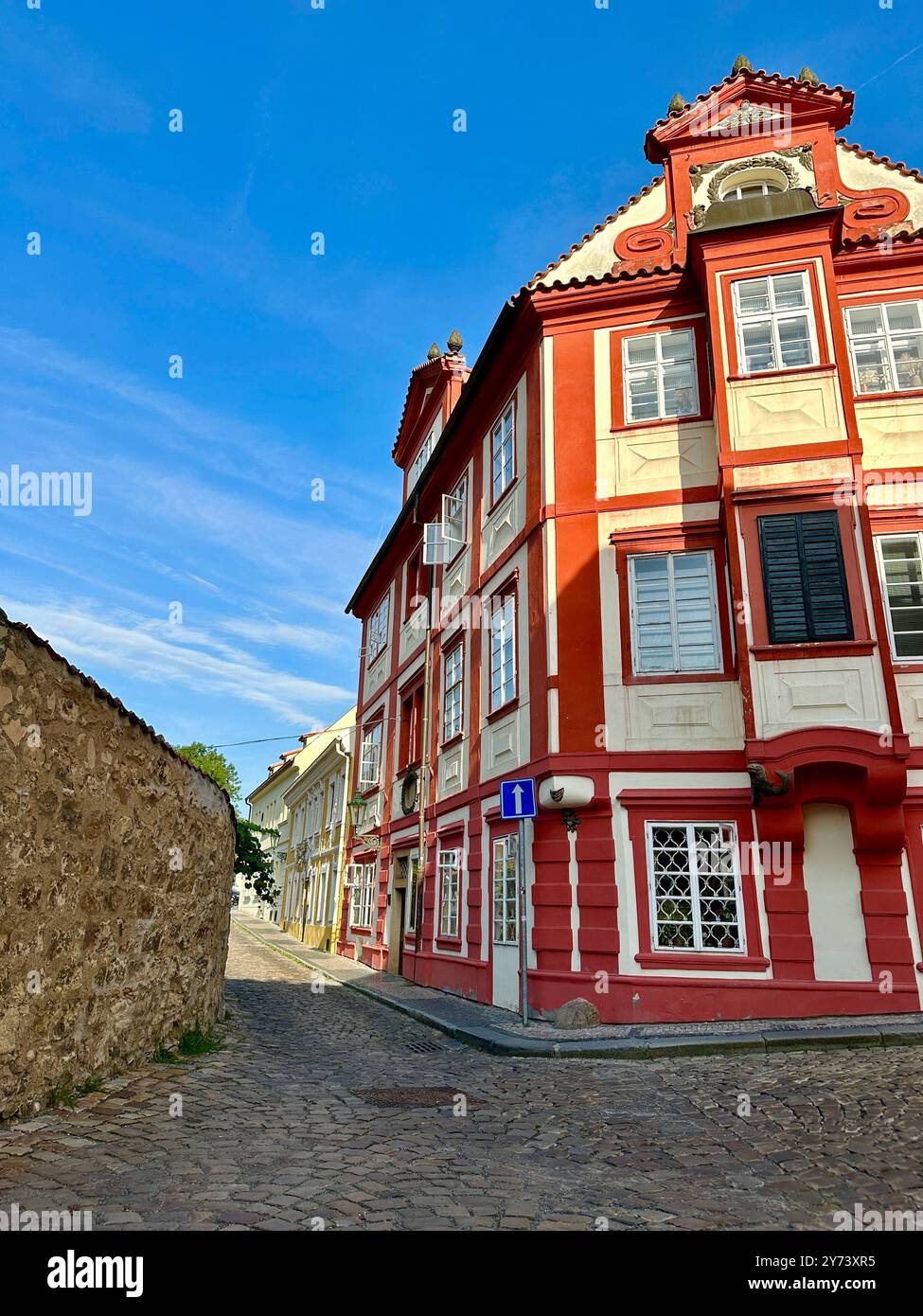 The photograph showcases a medieval European cityscape in summer ...