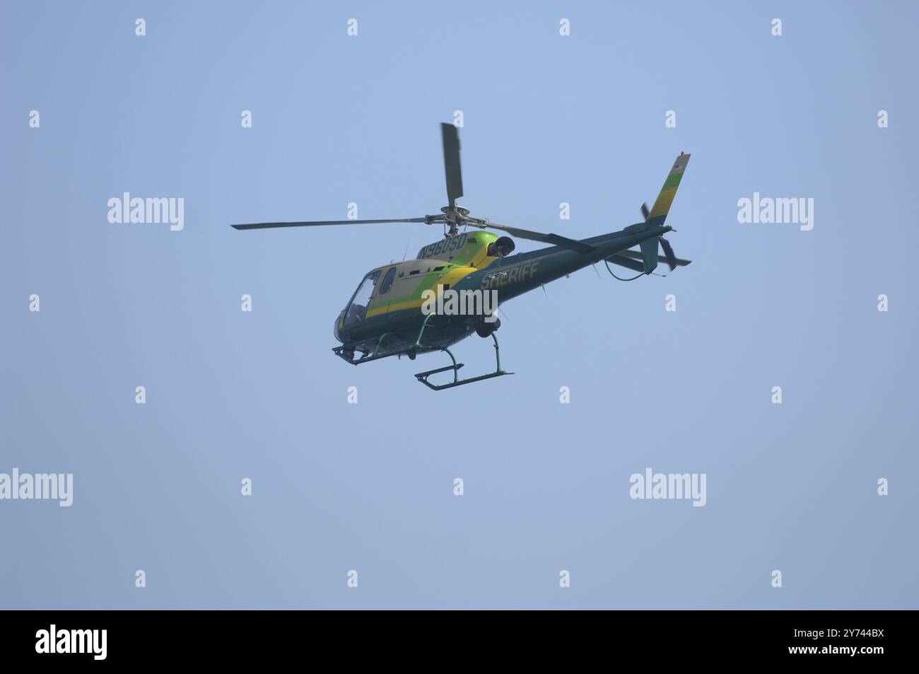 Aerial view of a Los Angeles County Sheriff's helicopter flying through ...
