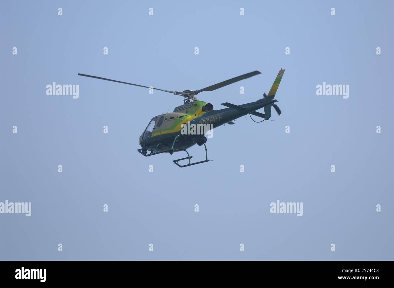 Aerial view of a Los Angeles County Sheriff's helicopter flying through ...