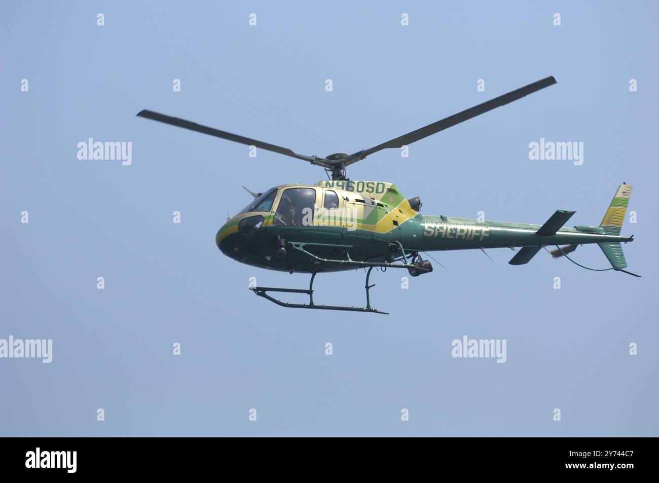 Aerial view of a Los Angeles County Sheriff's helicopter flying through ...