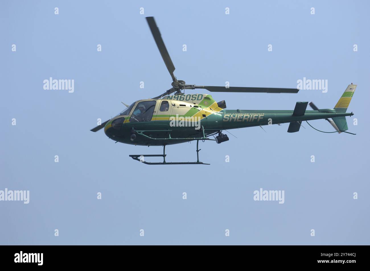Aerial view of a Los Angeles County Sheriff's helicopter flying through ...
