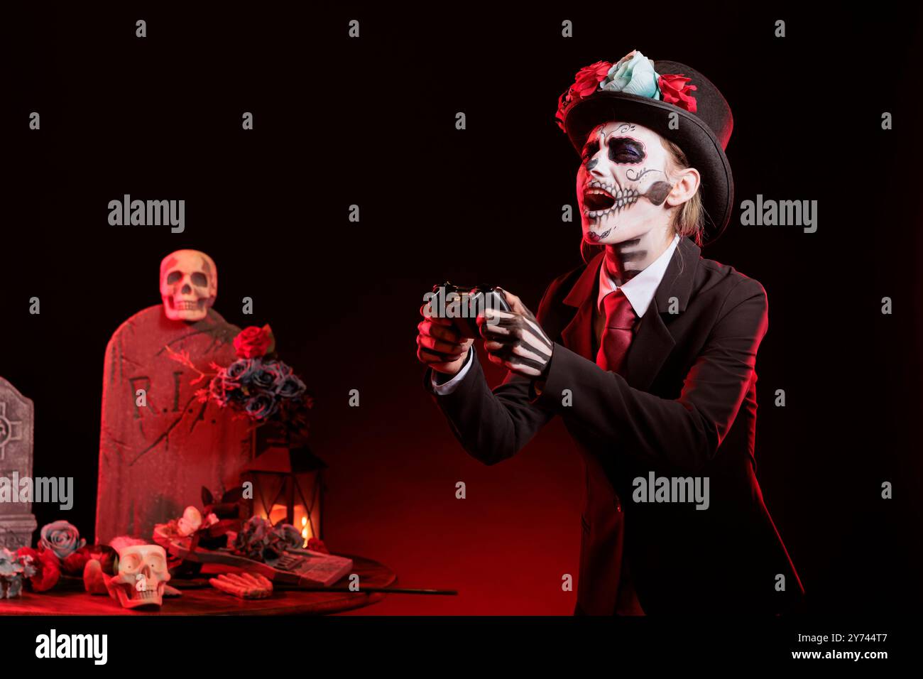 Lady gaming with gamepad at religious processions during Dia de los ...