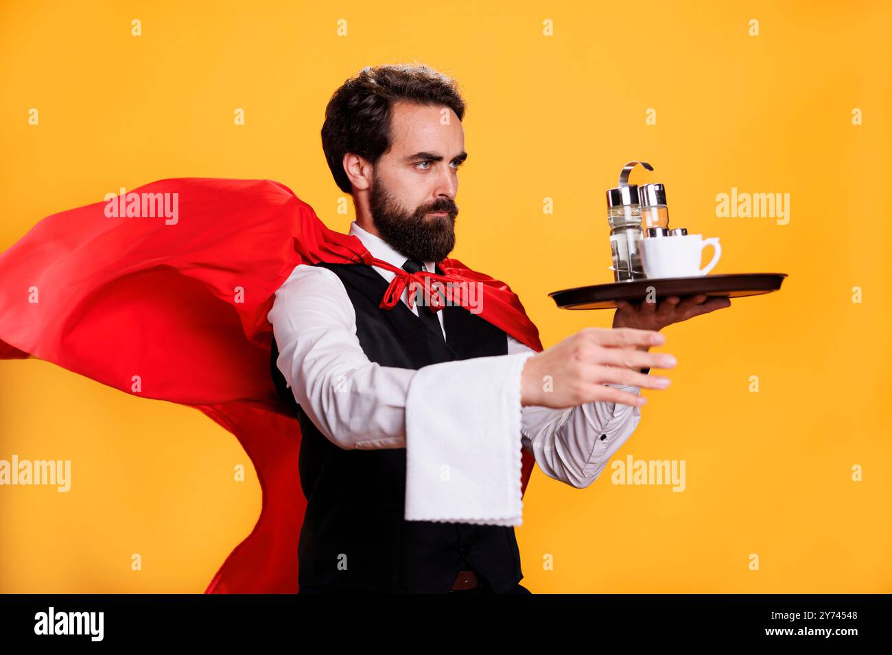 Strong hero butler concept with food plate and cape preparing to serve ...
