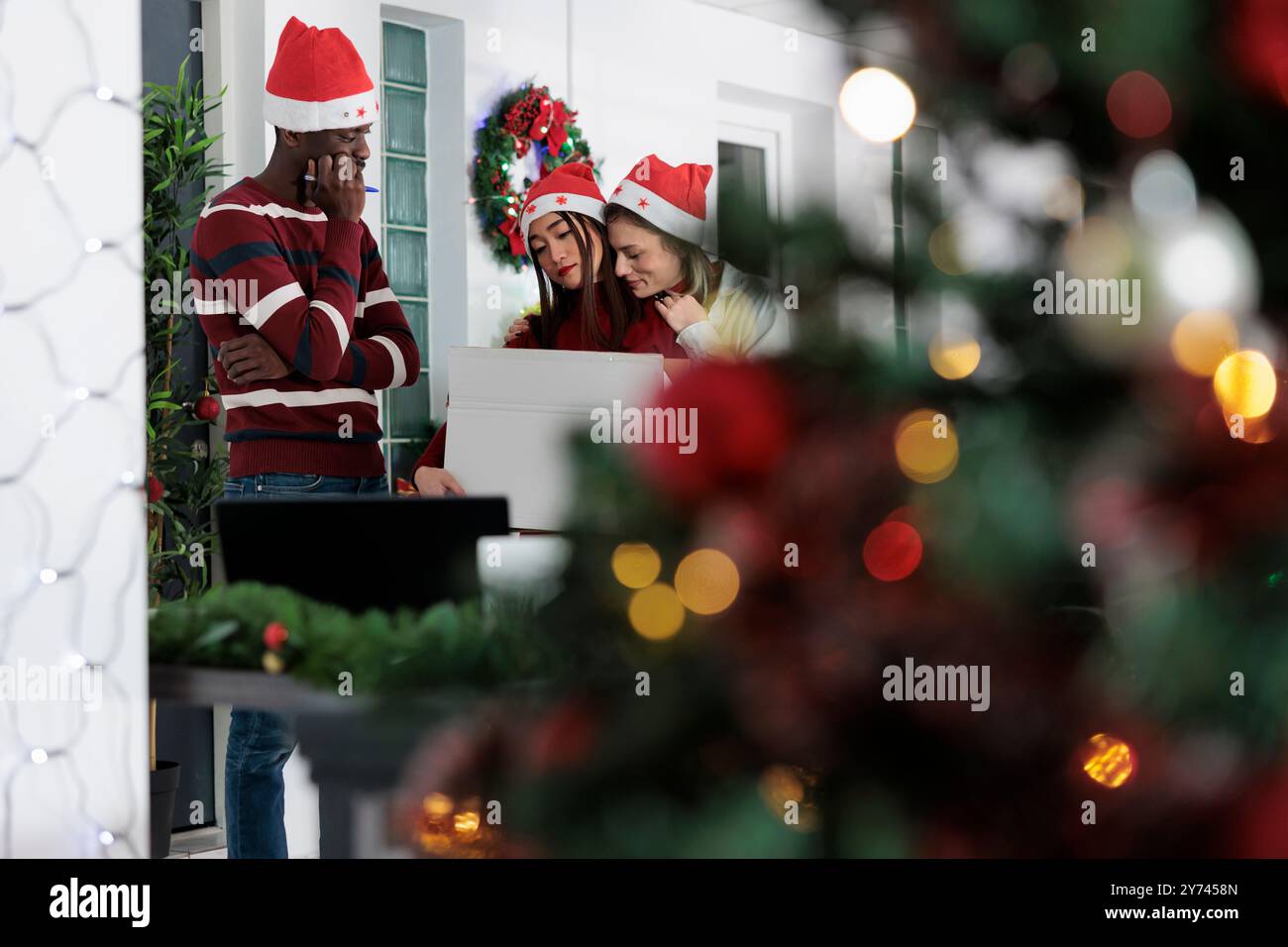 Worker holding box filled with desk belongings bidding farewell to ...
