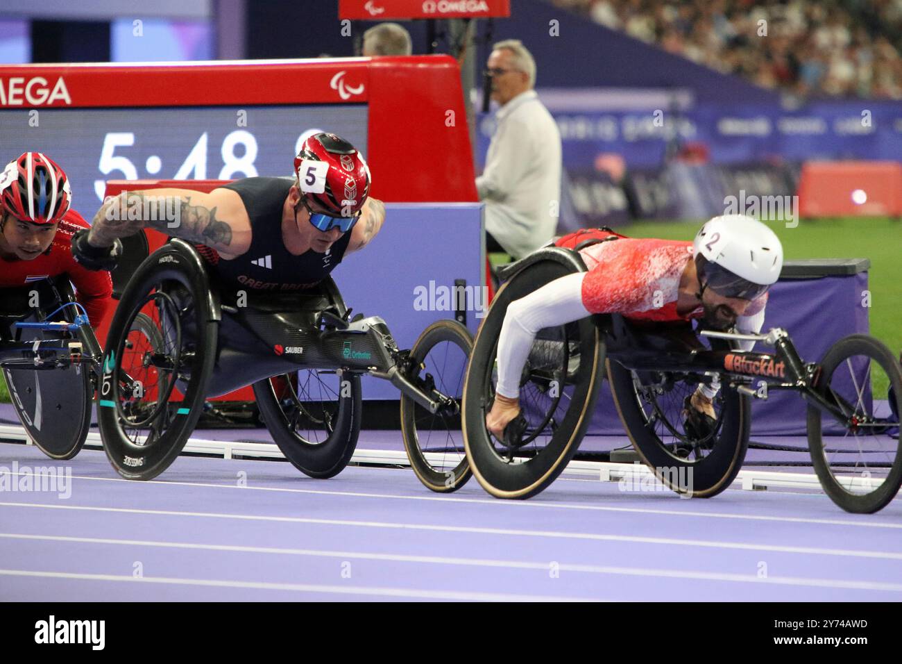 David Weir (T54) of Great Britain (red helmet) competing in the Para ...
