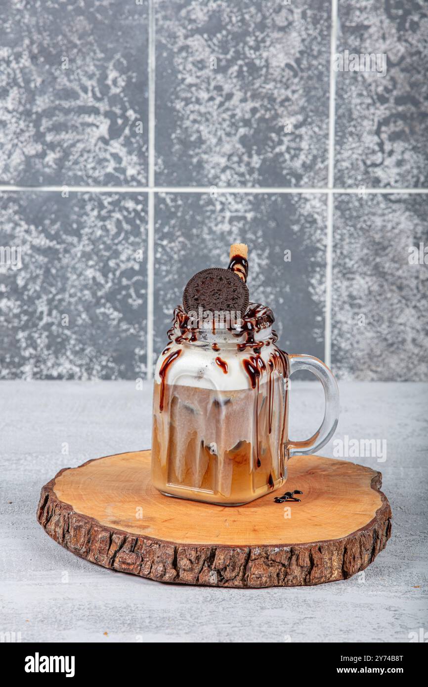 Chocolate milkshake in a jar. Chocolate indulgent extreme milkshake ...