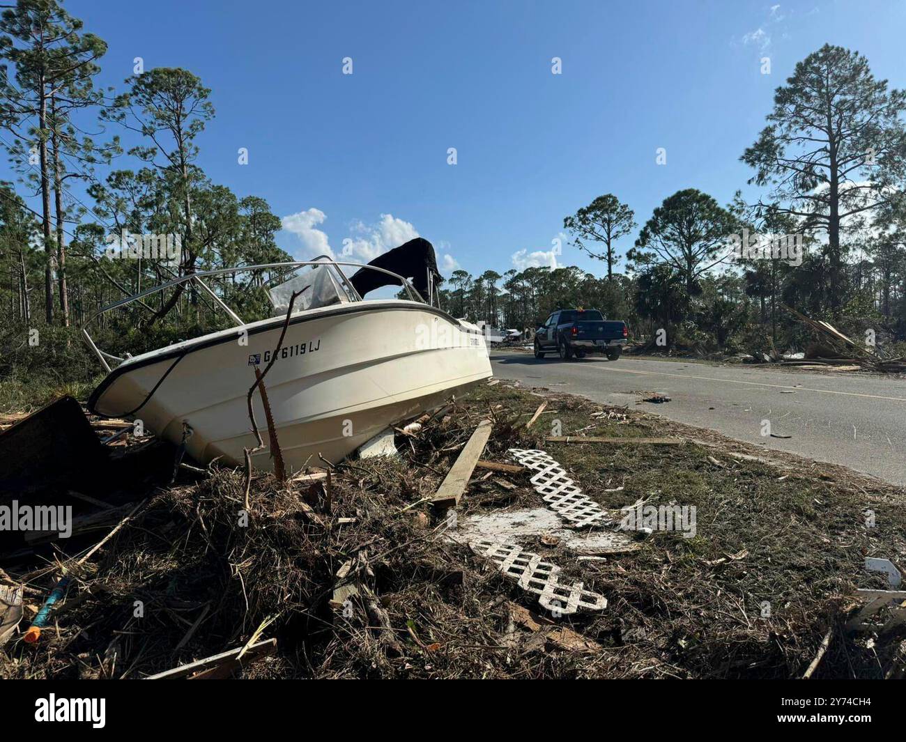 A boat sits washed ashore on Beach Road in coastal Taylor County, Fla ...