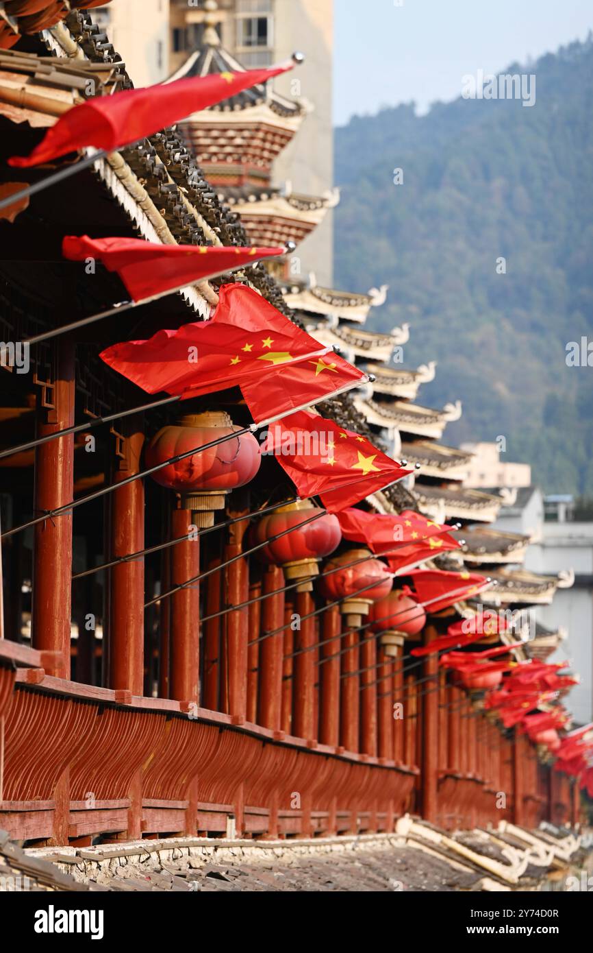 TONGREN, CHINA - SEPTEMBER 27, 2024 - Red flags are hung on both sides ...