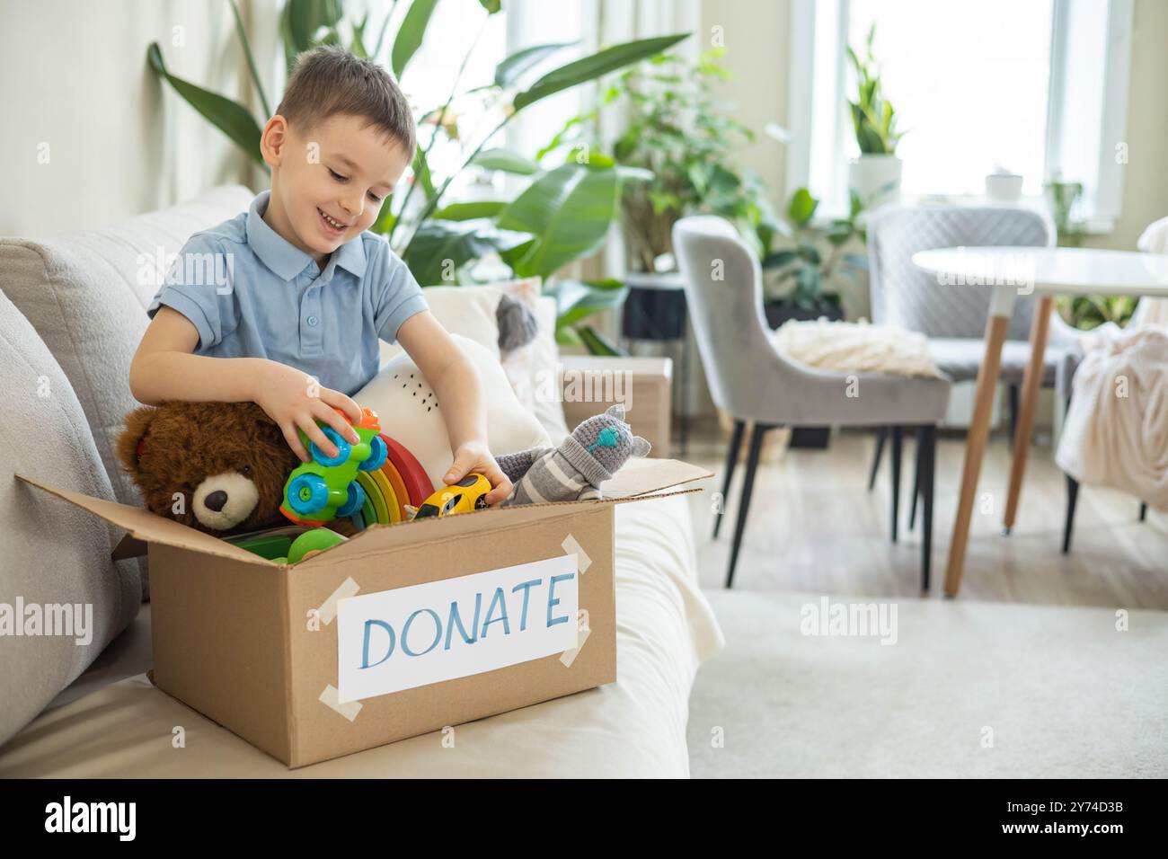 Cardboard box plant charity hi-res stock photography and images - Alamy