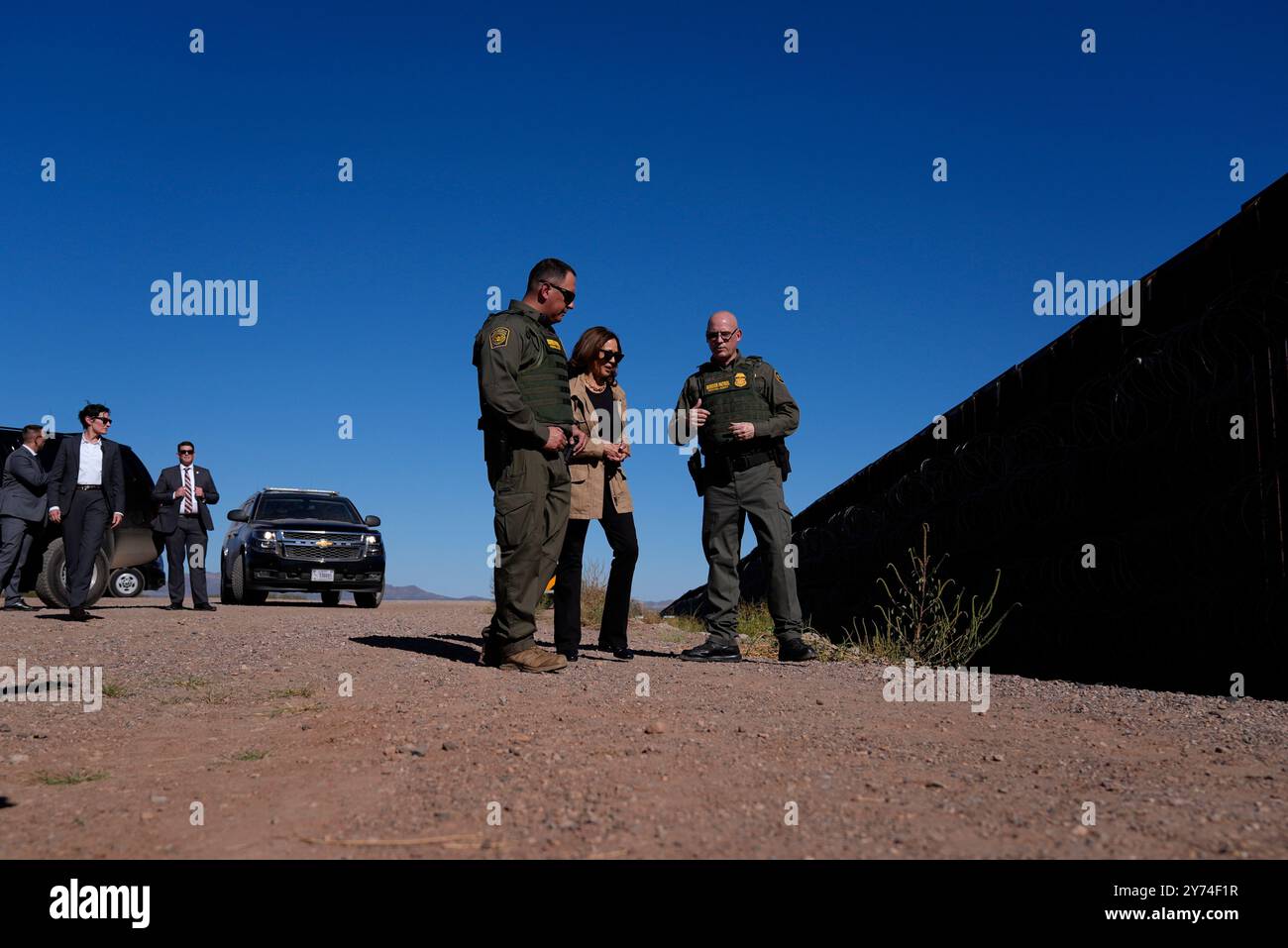 Democratic presidential nominee Vice President Kamala Harris talks with ...
