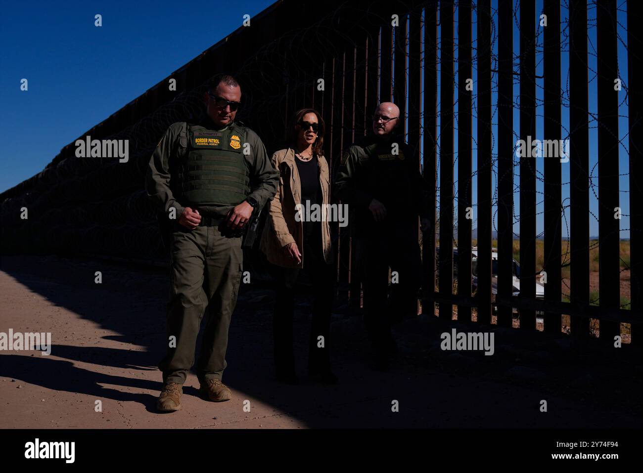 Democratic presidential nominee Vice President Kamala Harris talks with ...