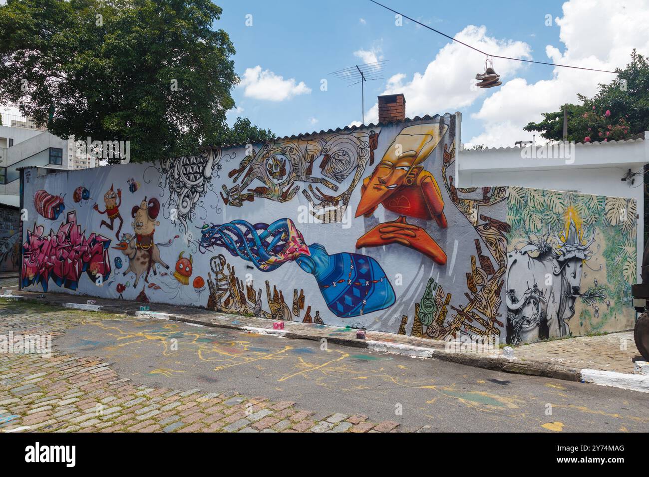 The Graffiti artwork on the walls of Beco do Batman, Batman alley, in ...
