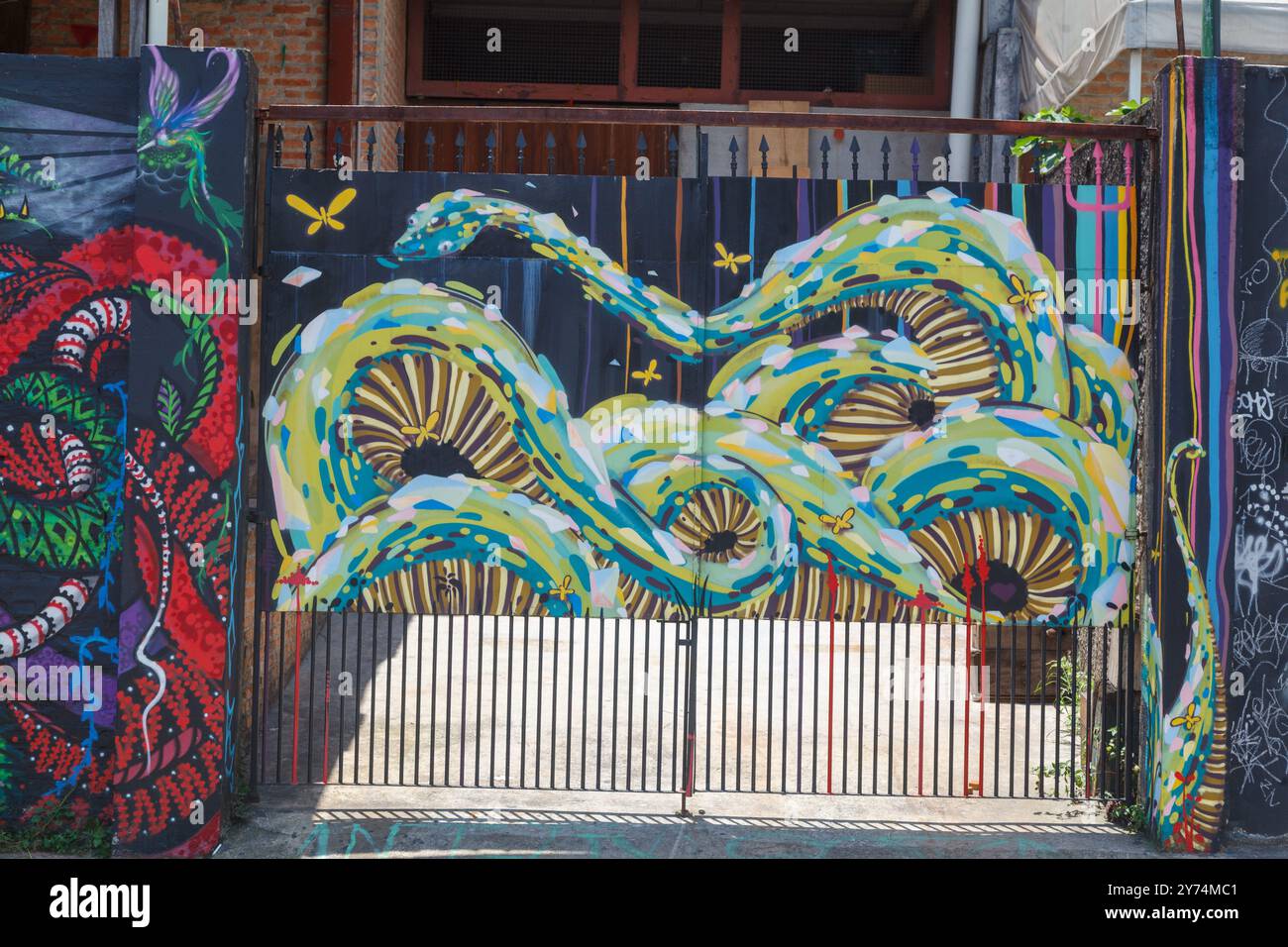 The Graffiti artwork on the walls of Beco do Batman, Batman alley, in ...