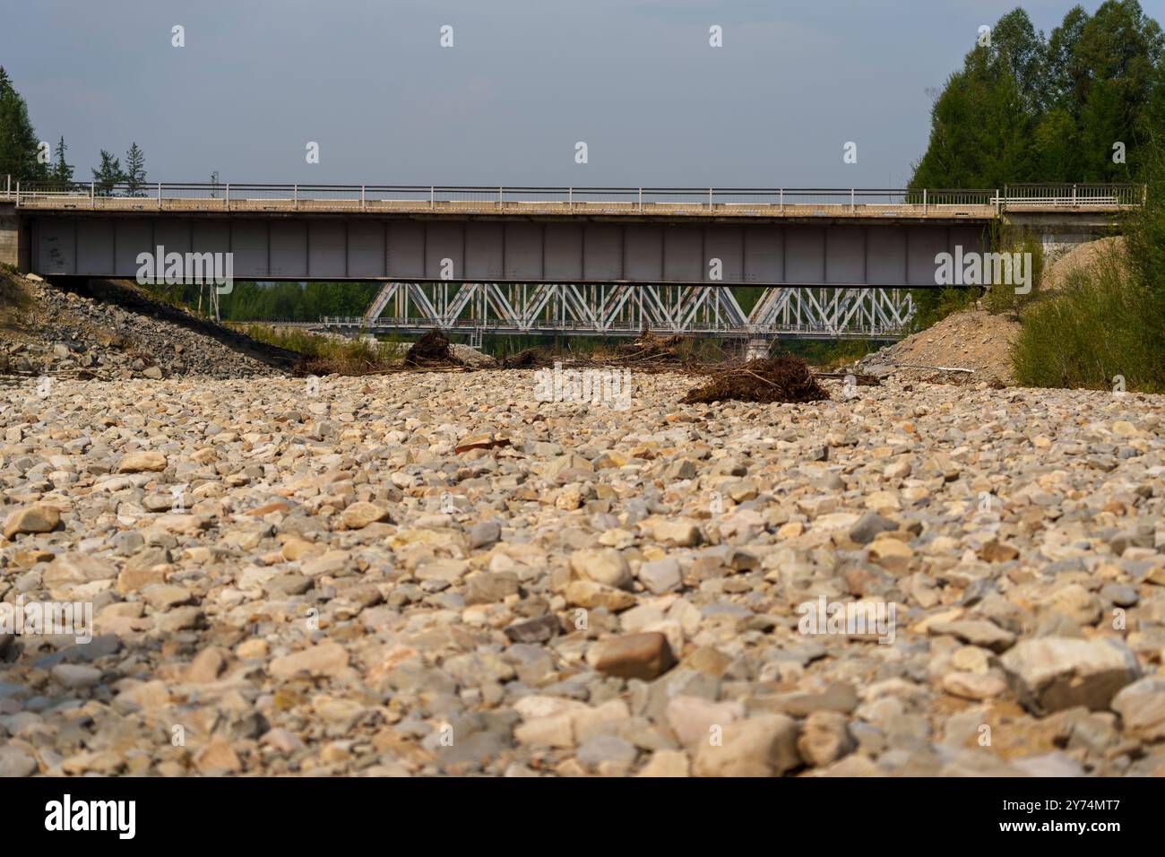 A view of two bridges, one for rail and one for vehicles, spanning a ...
