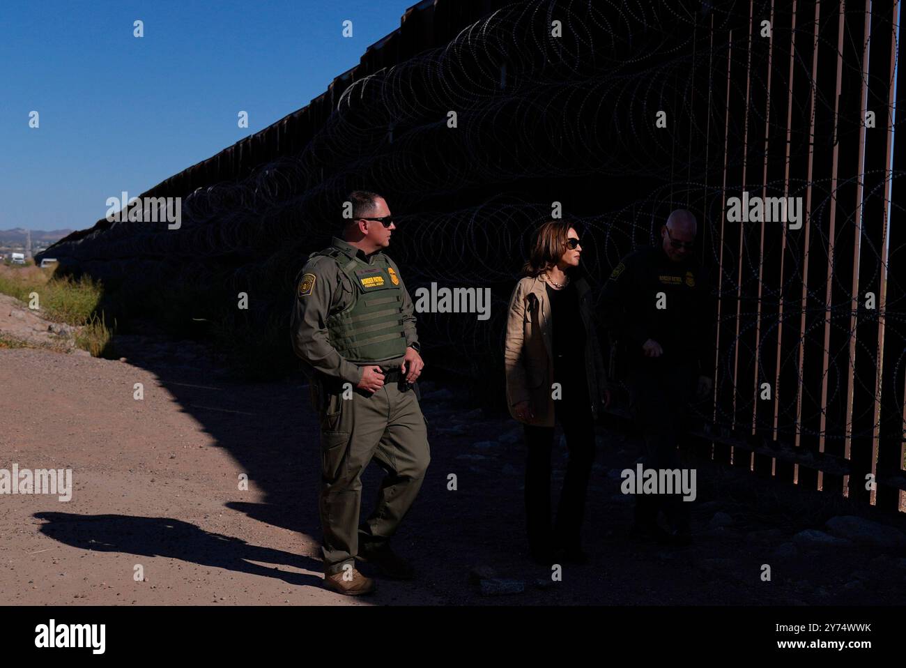 Democratic presidential nominee Vice President Kamala Harris talks with ...