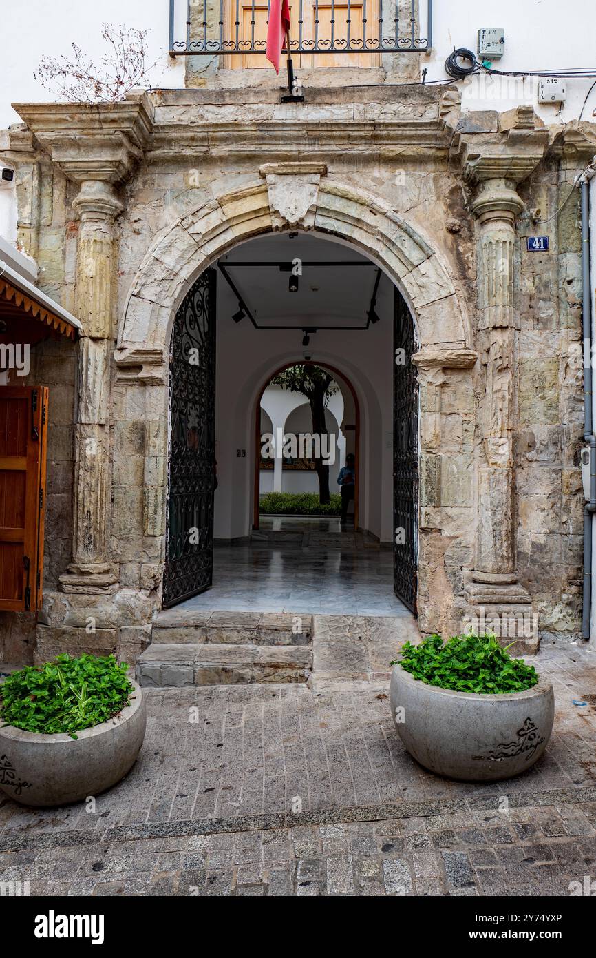 Carved stone entrance arch to Dar Niaba Museum, Tangier, Morocco Stock ...